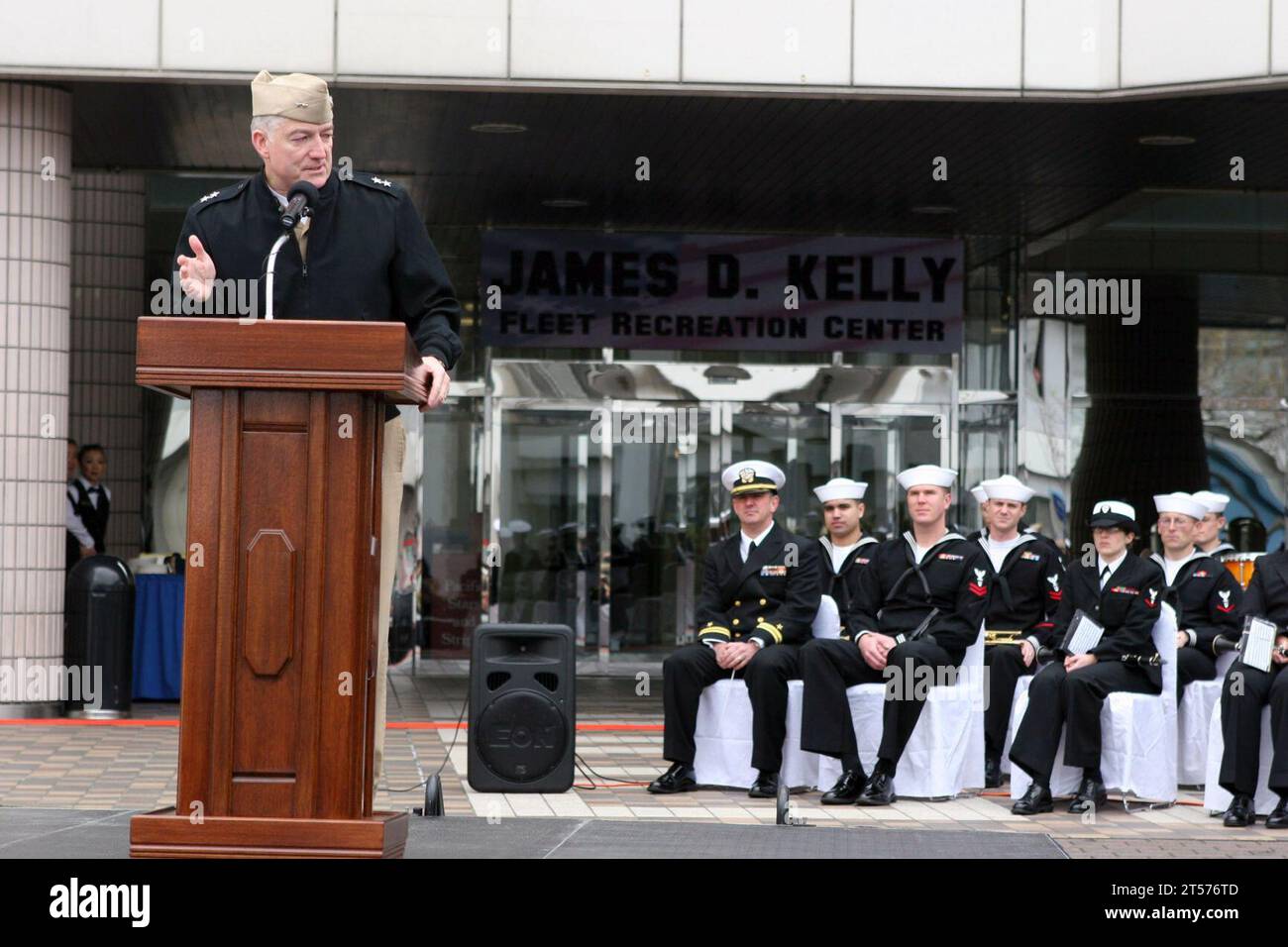 US Navy Rear Adm. James D. Kelly speaks in front of the newest named ...