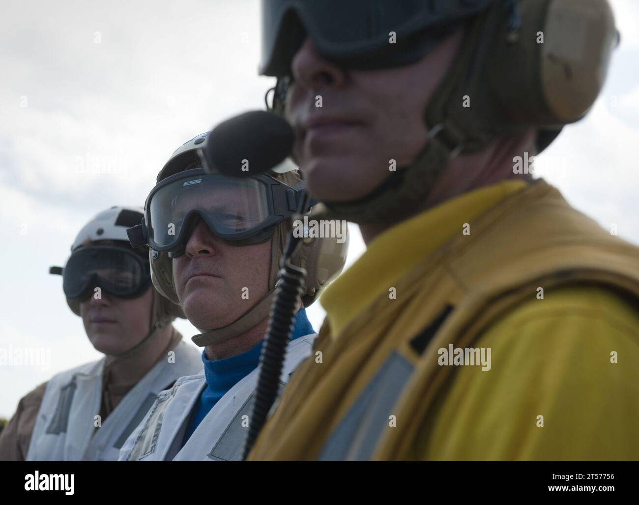 US Navy Rear Adm. Thomas K. Shannon, center, commander of Carrier ...