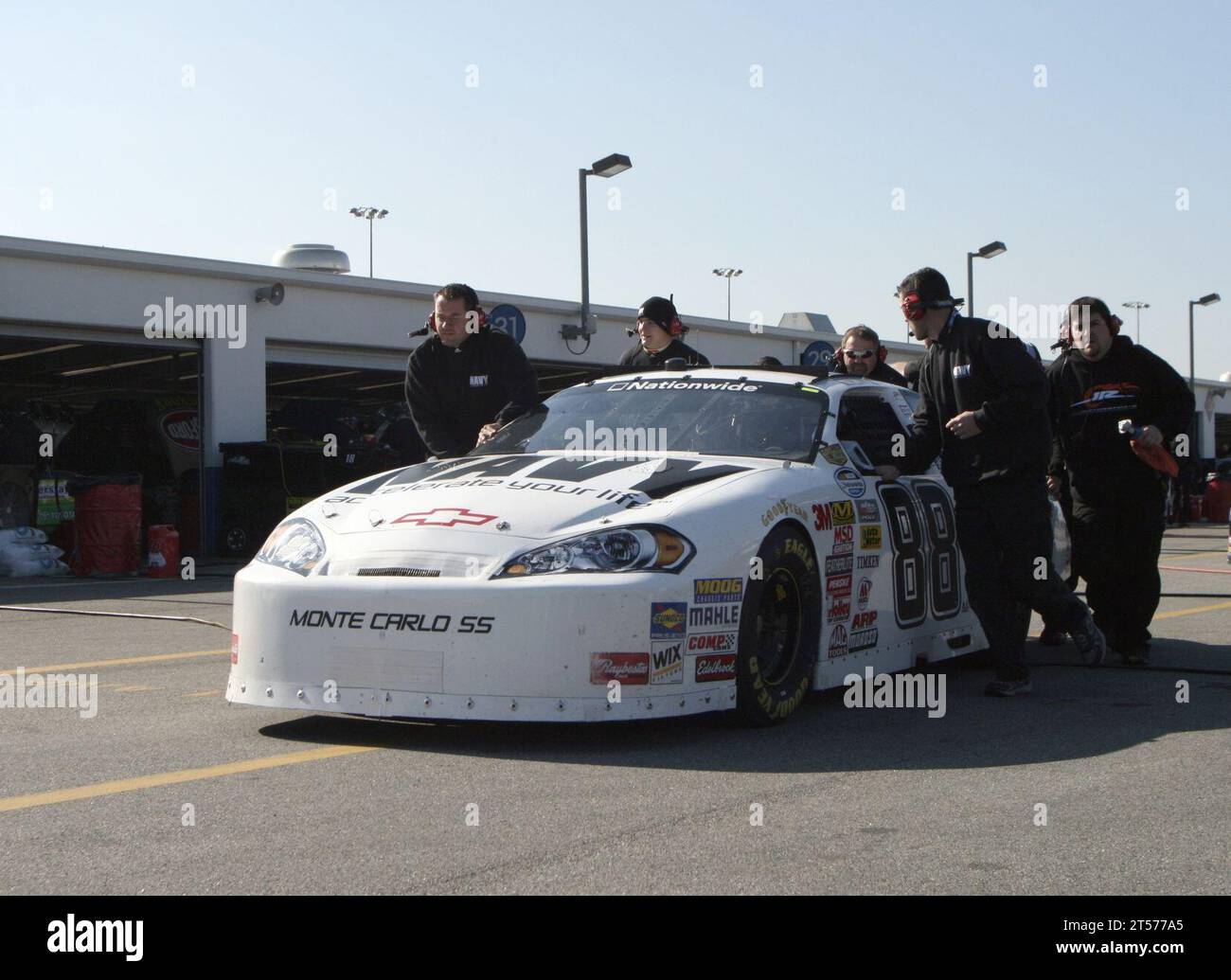 US Navy rew members lead the No. 88 Navy Accelerate Your Life Monte ...