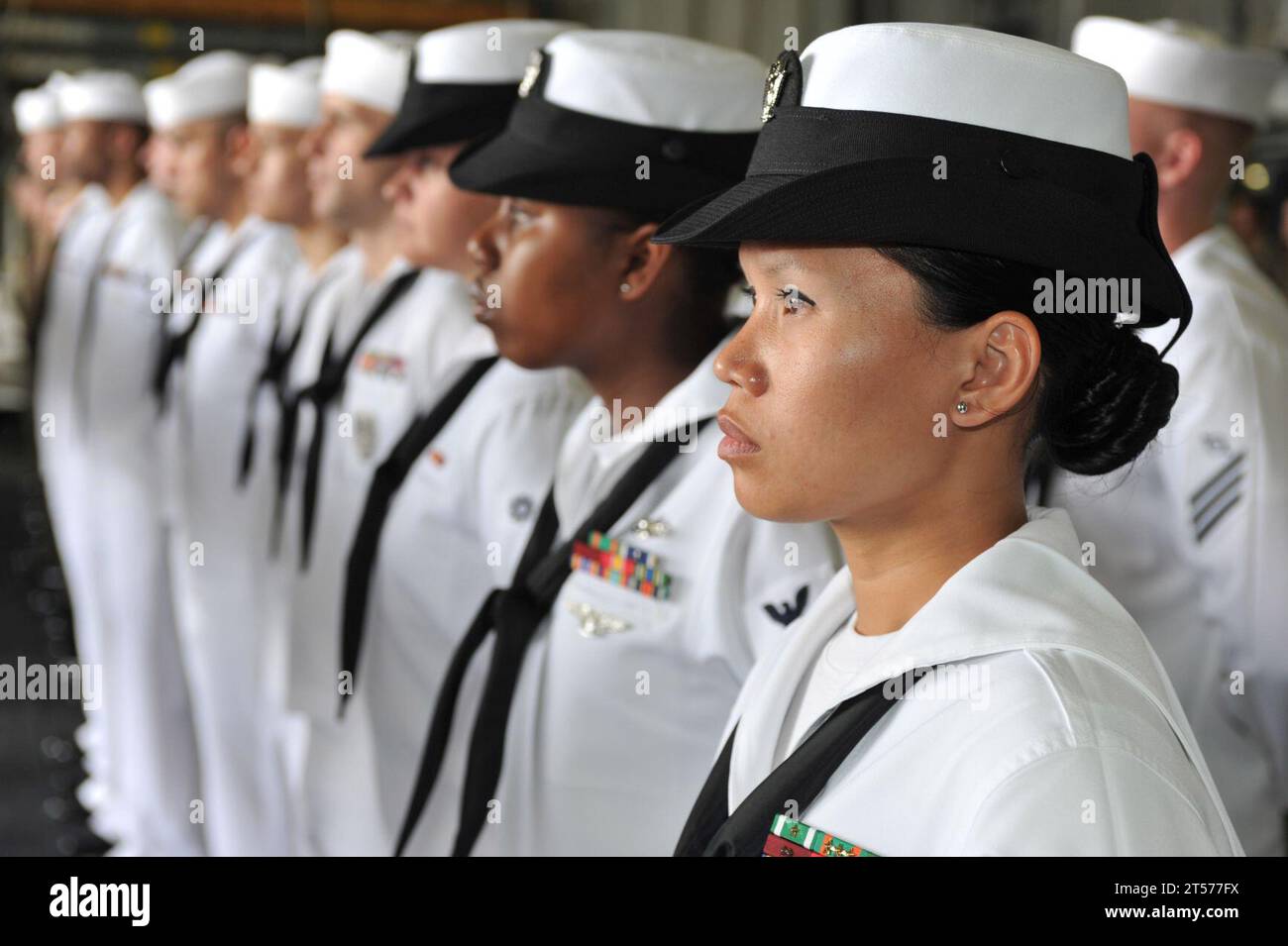 US Navy Sailors aboard the amphibious assault ship USS Makin Island ...
