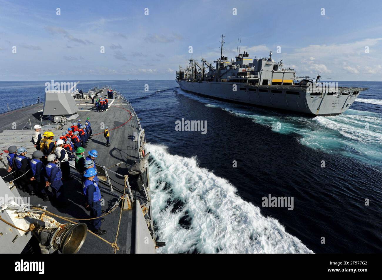 US Navy Sailors aboard the Arleigh Burke-class guided-missile destroyer ...