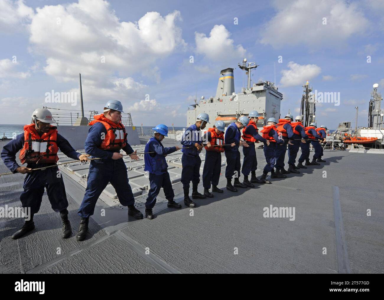 US Navy Sailors aboard the Arleigh Burke-class guided-missile destroyer ...
