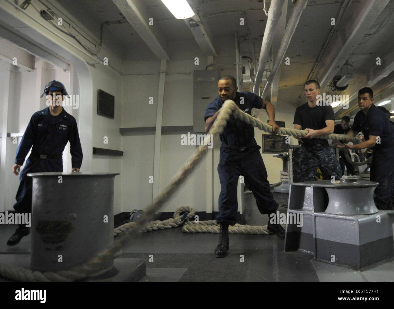 US Navy Sailors aboard the aircraft carrier USS Enterprise (CVN-65 ...