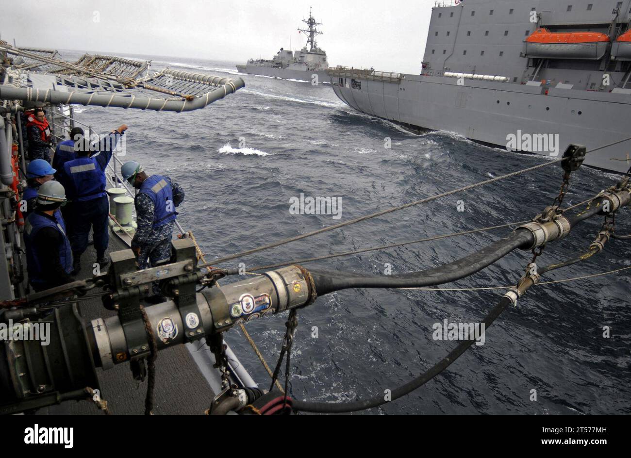 US Navy Sailors aboard the guided-missile cruiser USS Bunker Hill (CG ...