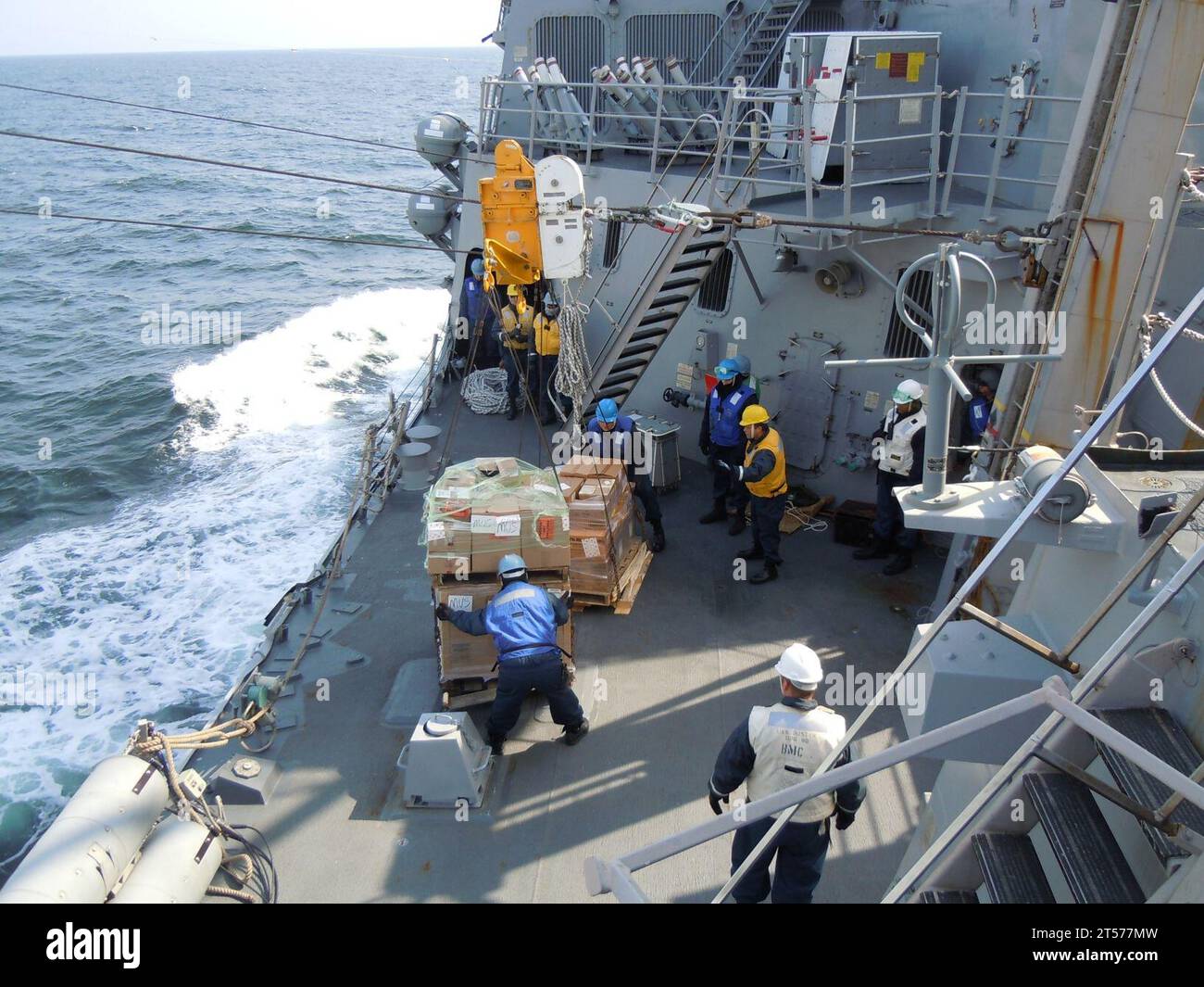 US Navy Sailors aboard the guided-missile destroyer USS Mustin (DDG 89 ...