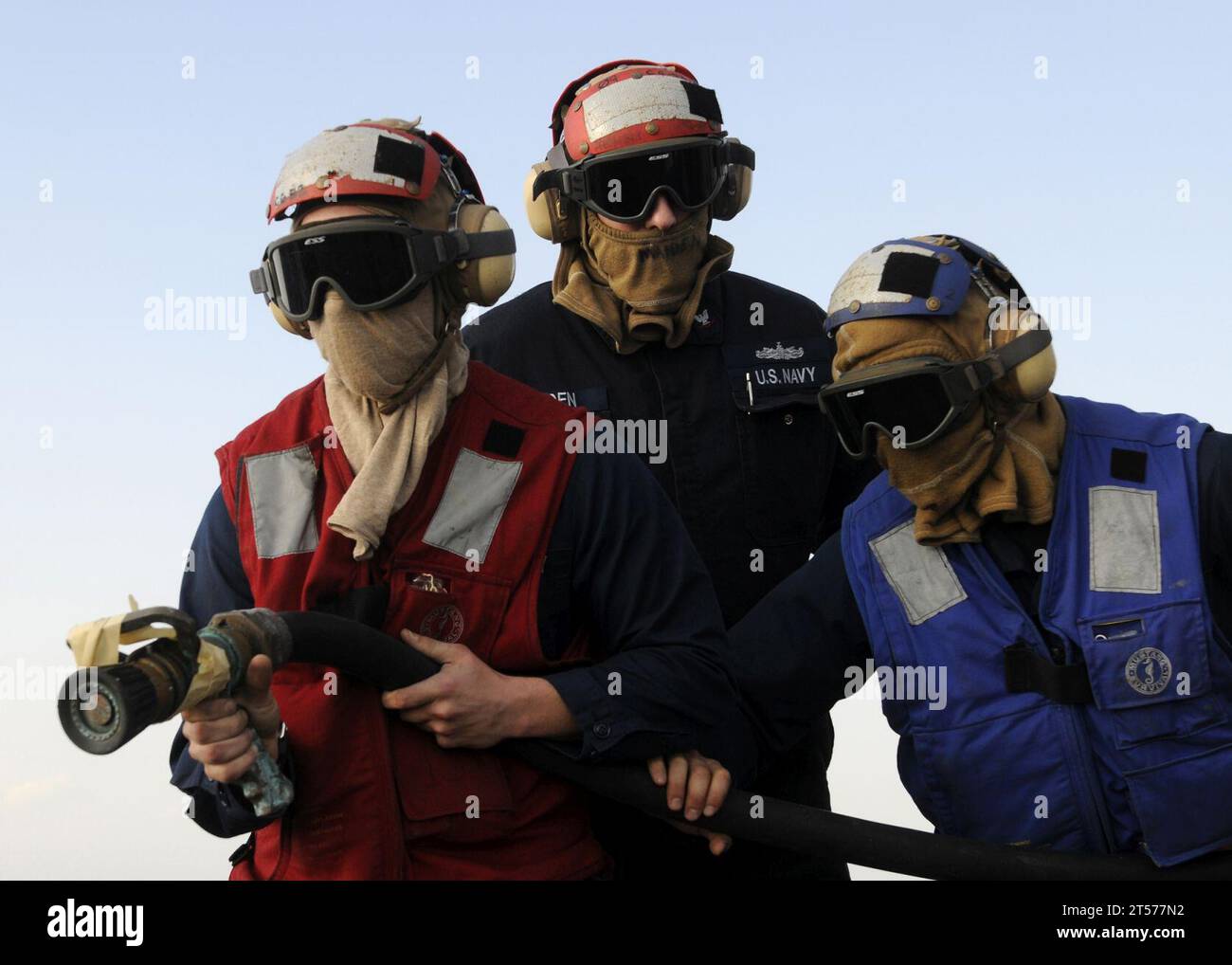 US Navy Sailors aboard the guided-missile cruiser USS Bunker Hill (CG ...