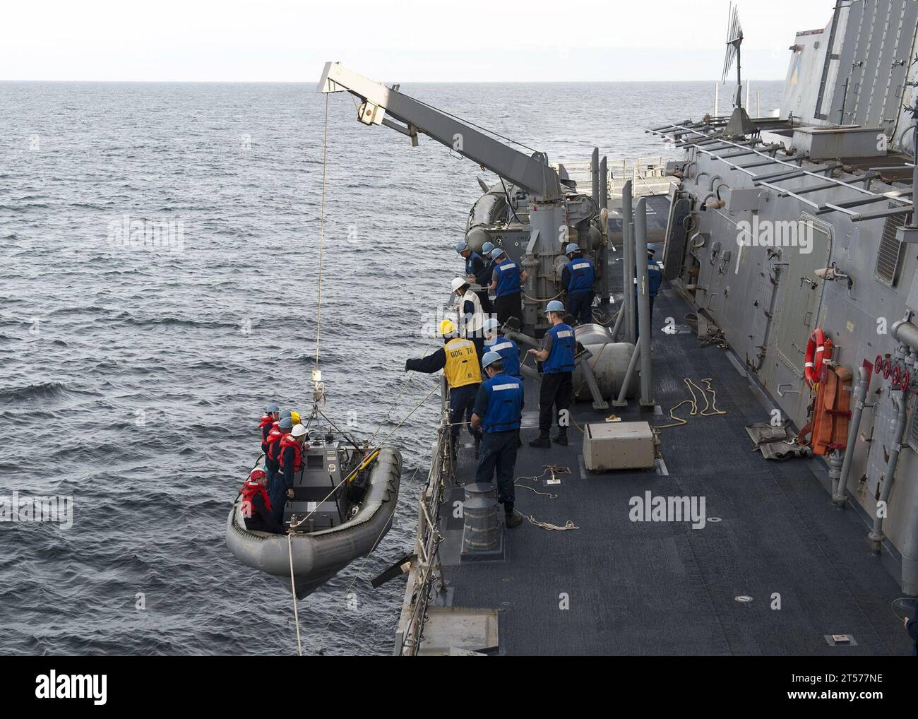 US Navy Sailors aboard the Arleigh Burke-class guided-missile destroyer ...