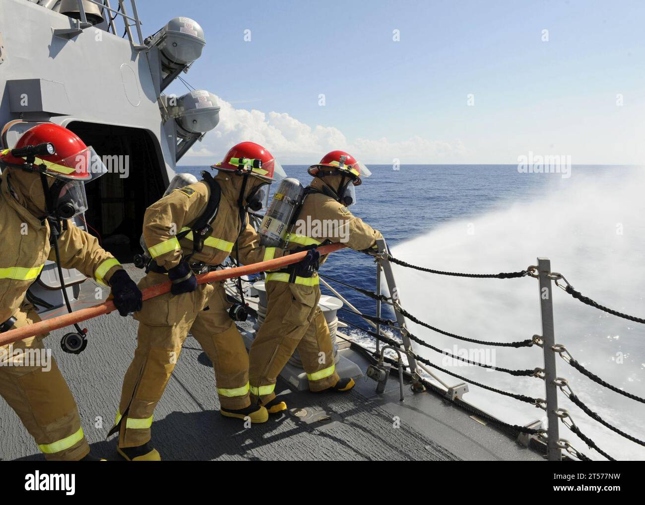 US Navy Sailors aboard the Arleigh Burke-class guided-missile destroyer ...