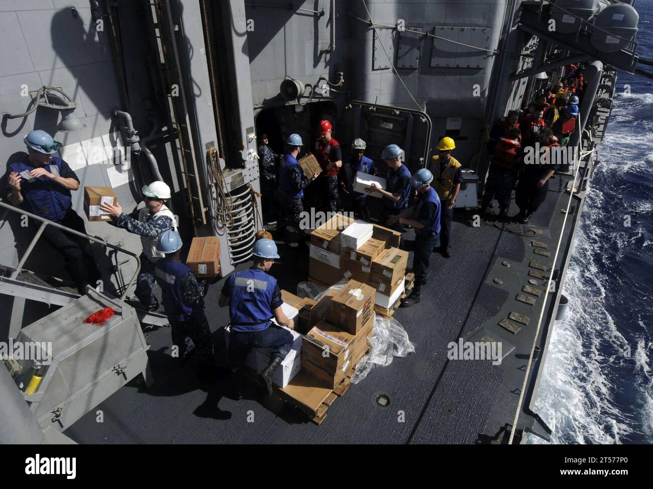 US Navy Sailors aboard the guided-missile cruiser USS Bunker Hill (CG ...