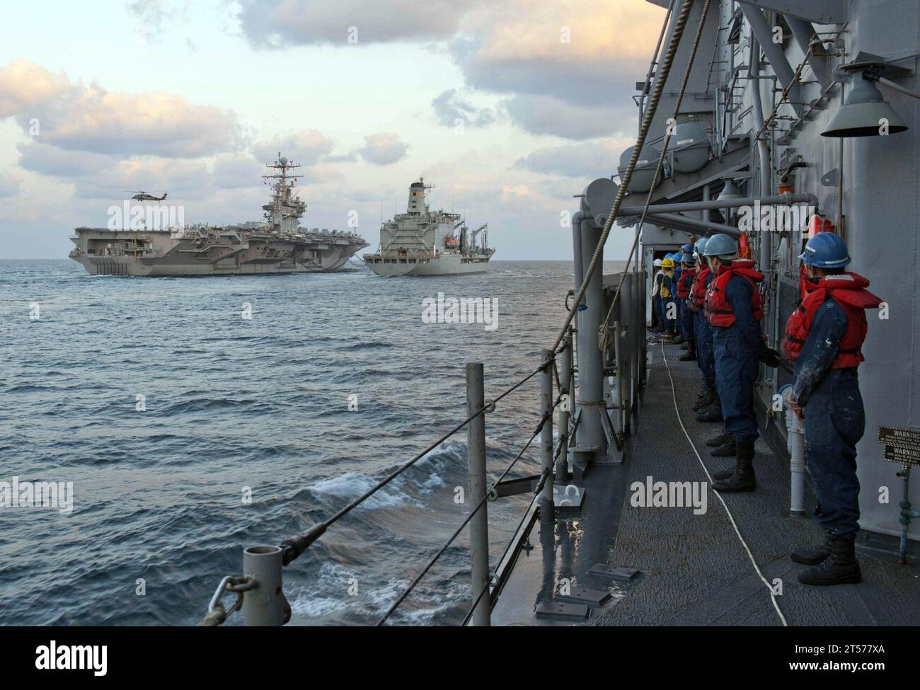 US Navy Sailors aboard the Ticonderoga-class guided-missile cruiser USS ...
