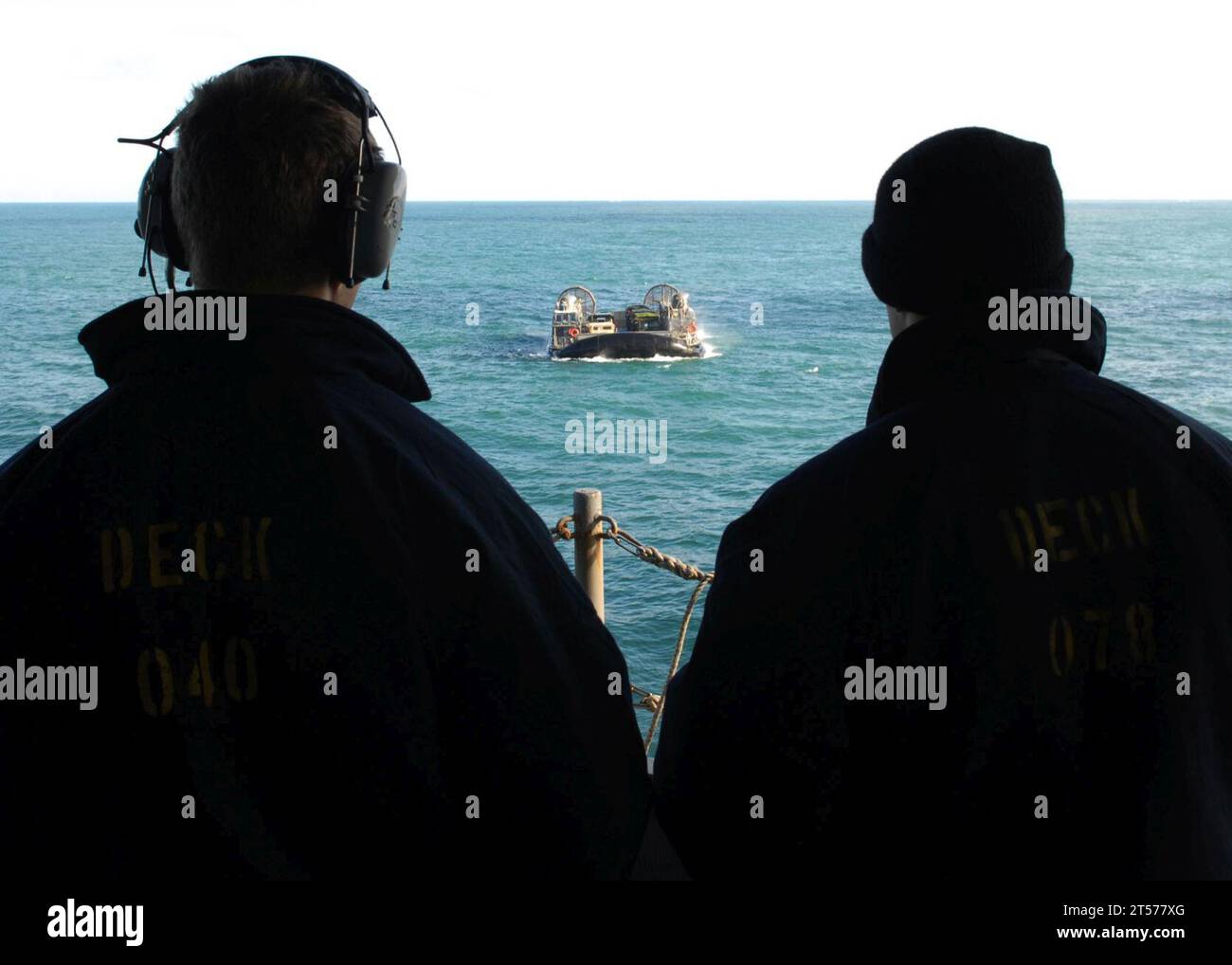 US Navy Sailors aboard the multi-purpose amphibious assault ship USS ...