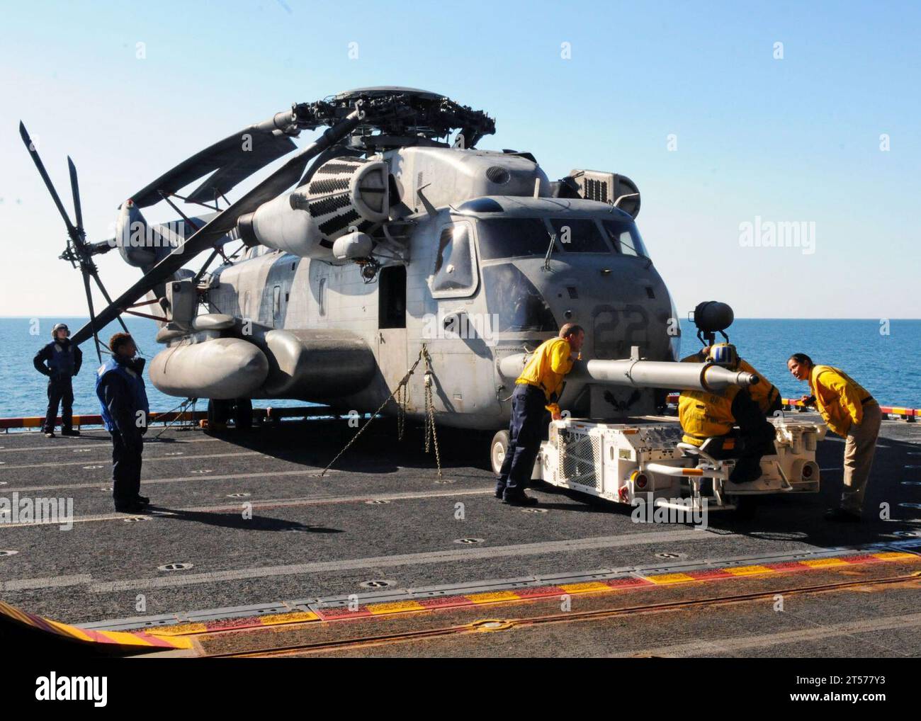US Navy Sailors aboard the multipurpose amphibious assault ship USS Iwo ...