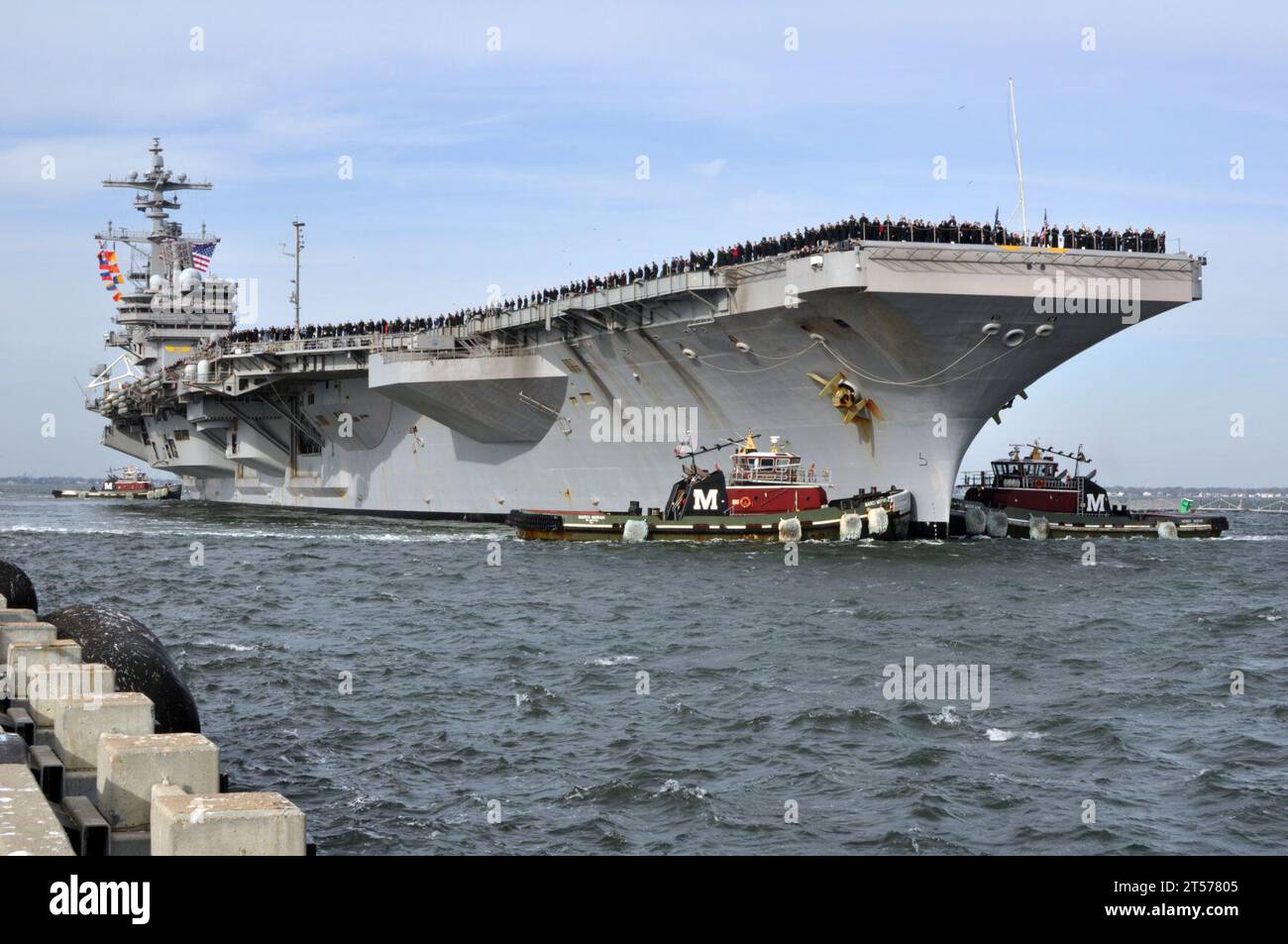 US Navy Sailors aboard the USS George H.W. Bush man the rails.jpg Stock ...