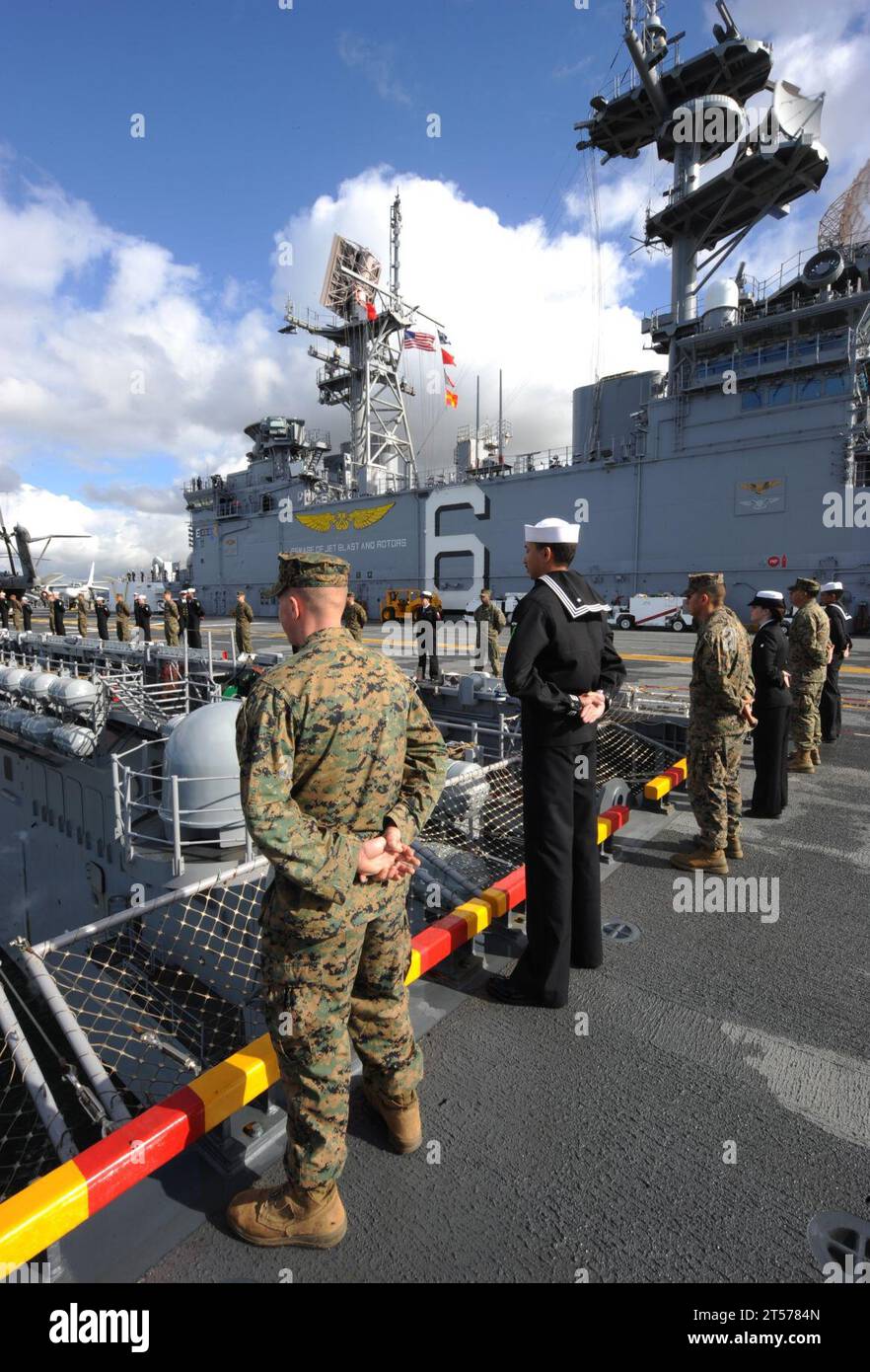 US Navy Sailors and Marines aboard USS Bonhomme Richard (LHD-6) man the ...