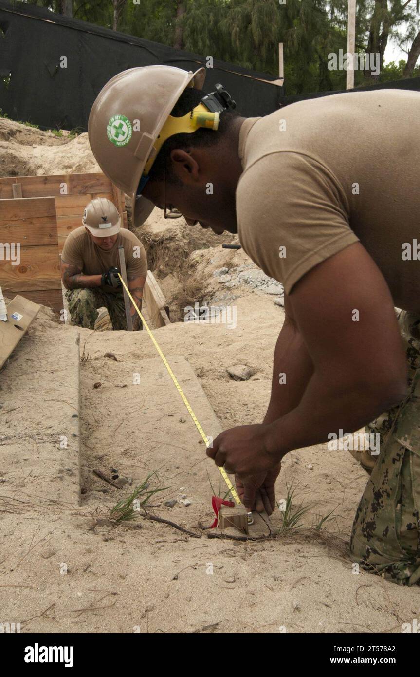 US Navy Sailors assigned to Construction Battalion Maintenance Unit ...
