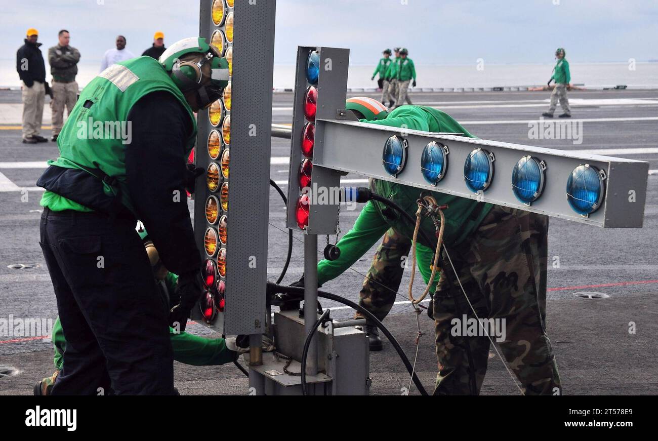 US Navy Sailors assigned to the aircraft carrier USS Enterprise (CVN 65 ...