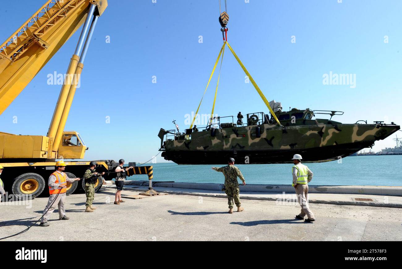 US Navy Sailors assigned to Riverine Squadron (RIVRON) 2 prepare to ...