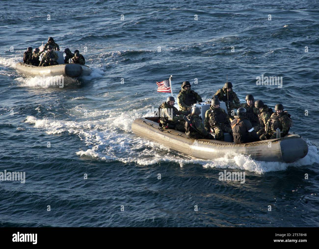US Navy Sailors assigned to the Arleigh Burke-class guided-missile ...