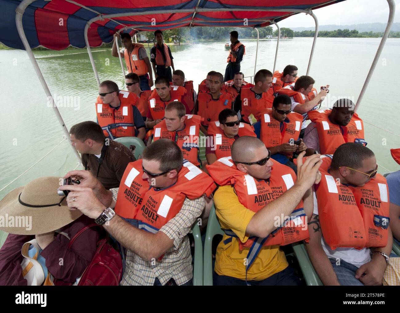 US Navy Sailors assigned to the mine countermeasures ship USS Defender ...