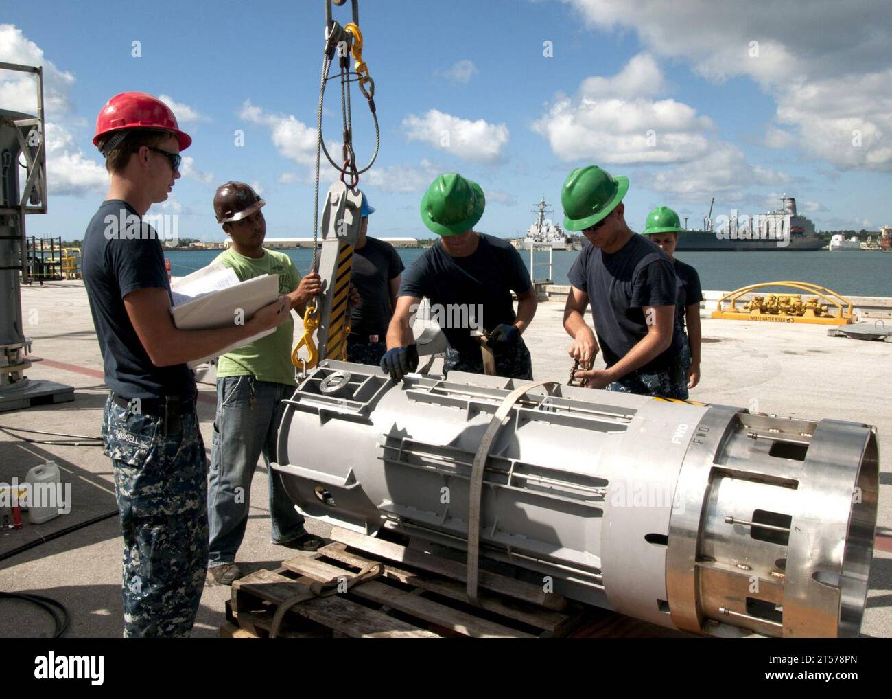 US Navy Sailors assigned to the submarine tender USS Frank Cable (AS 40 ...