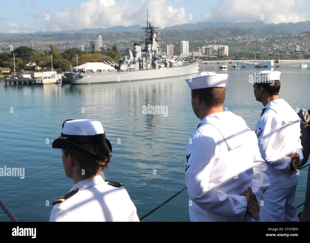 US Navy Sailors assigned to the submarine tender USS Frank Cable (AS 40 ...