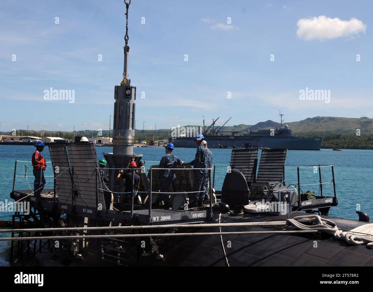 US Navy Sailors assigned to the submarine tender USS Frank Cable (AS 40 ...