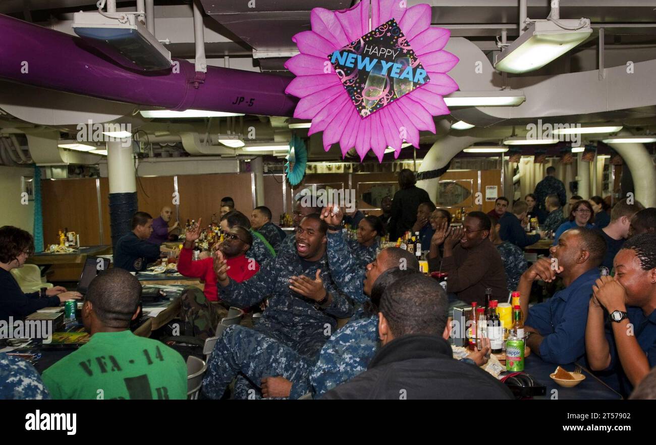 US Navy Sailors celebrate New Year's Eve in the aft mess decks aboard ...