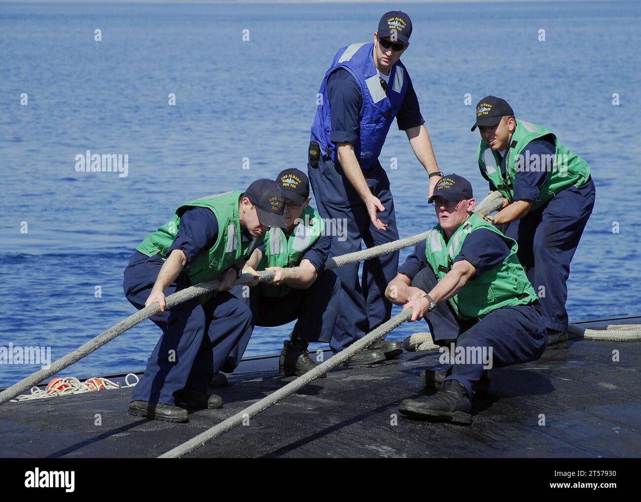US Navy Sailors conduct mooring operations aboard the fast attack ...