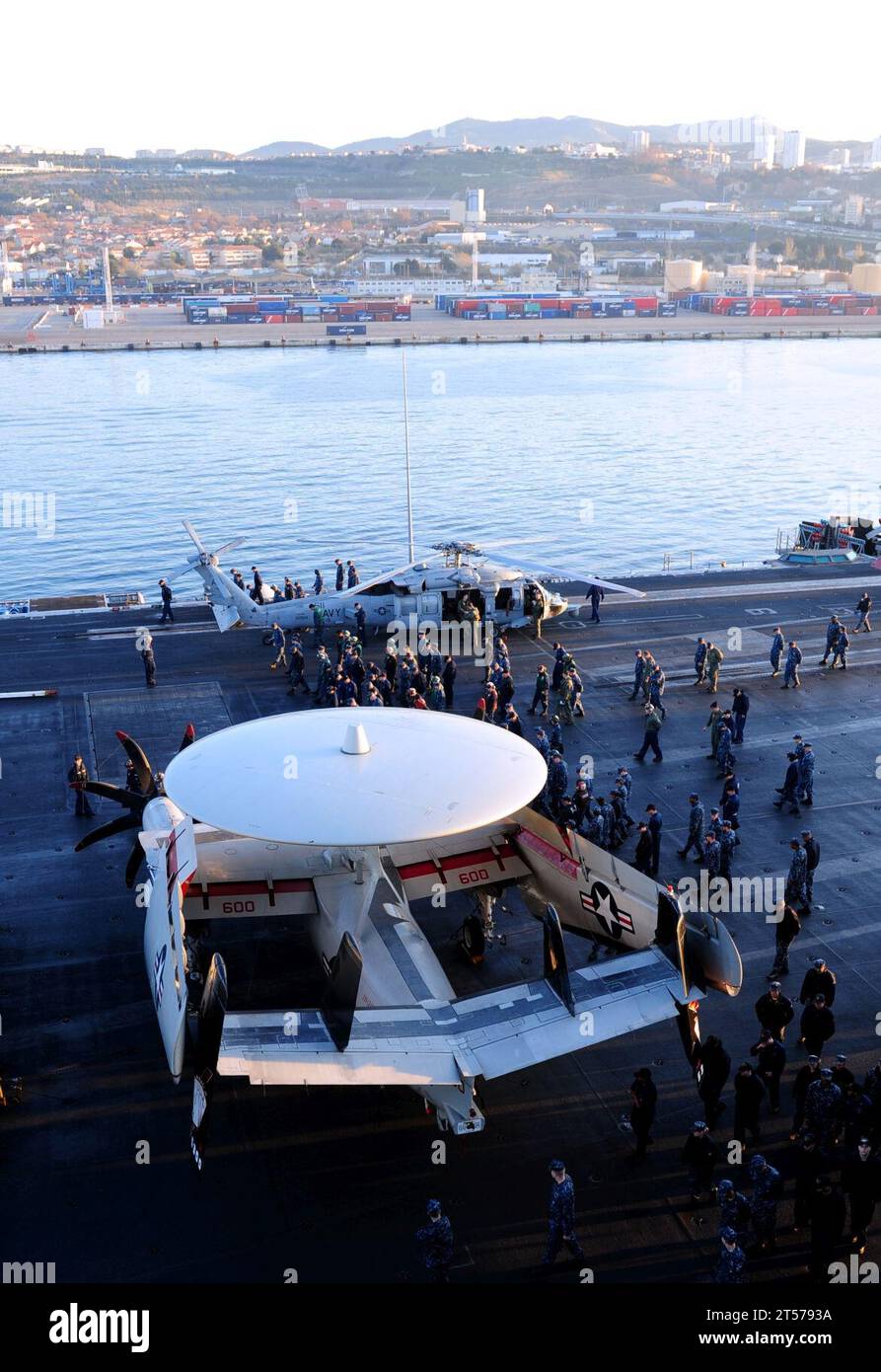 US Navy Sailors conduct a foreign object debris (FOD) walk down on the ...