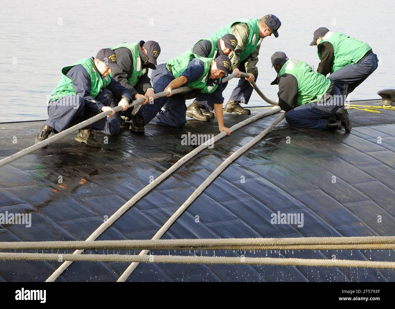 US Navy Sailors conduct mooring operations as the Los Angeles-class ...