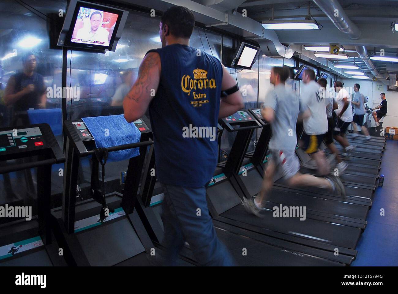 US Navy Sailors exercise aboard the aircraft carrier USS Nimitz (CVN 68 ...
