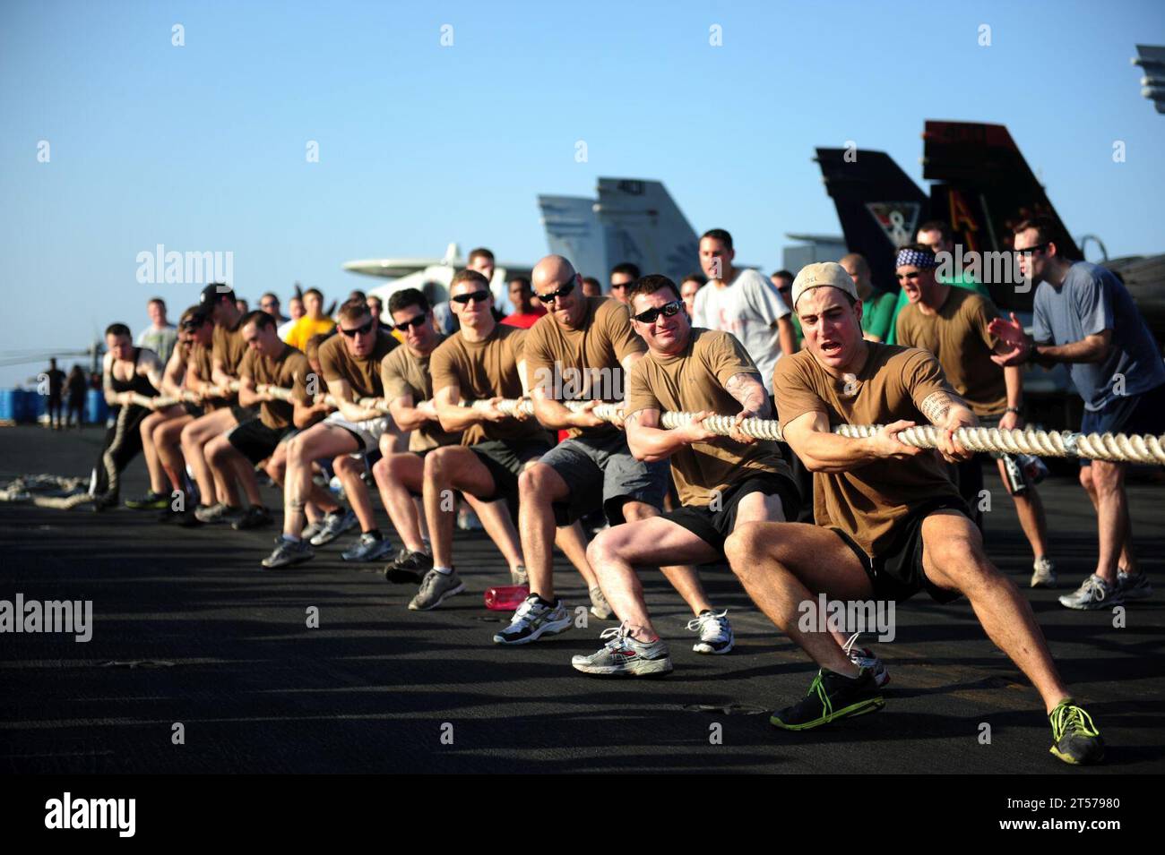 US Navy Sailors from Helicopter Sea Combat Squadron 9 compete in a tug ...