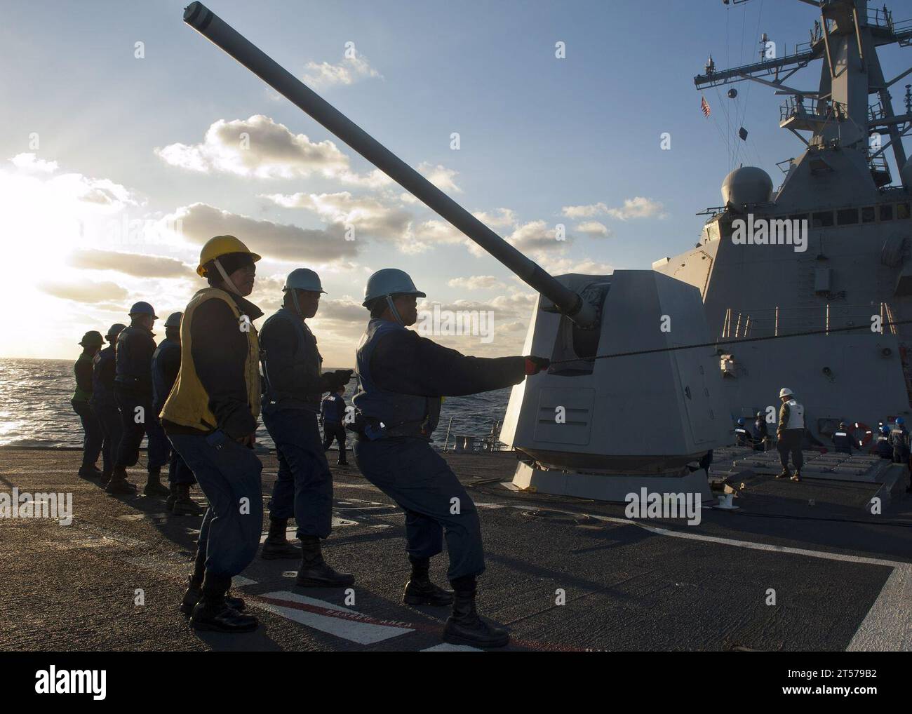 US Navy Sailors handle the phone and distance line during an underway ...
