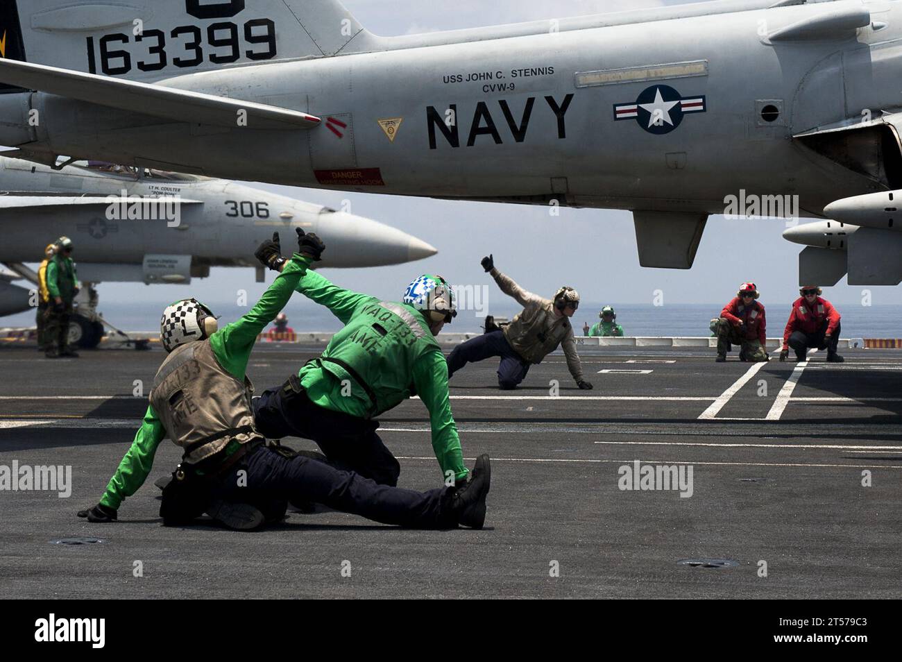 US Navy Sailors give launch approval for an EA-6B Prowler assigned to ...