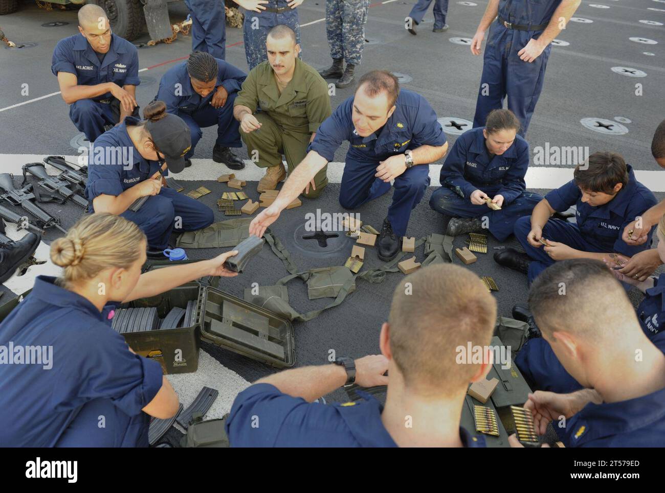 US Navy Sailors load magazines prior to a live fire exercise.jpg Stock ...