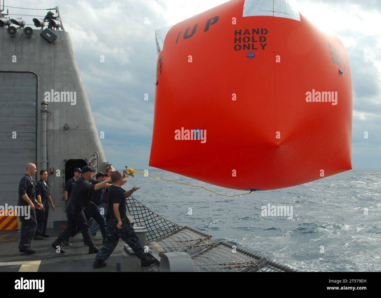 US Navy Sailors launch a Killer Tomato target from the littoral combat ...