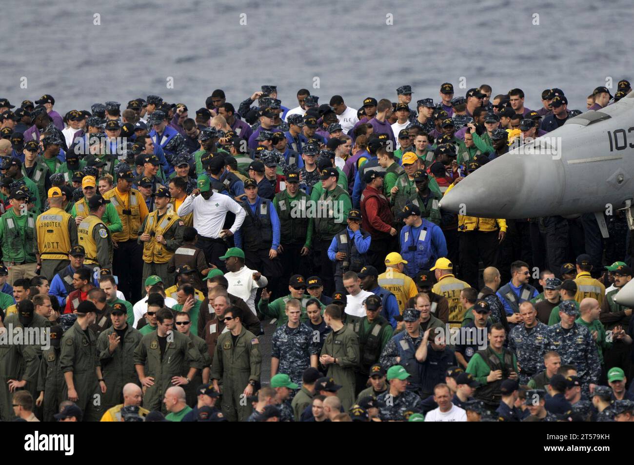US Navy Sailors participate in a Foreign Object Damage (FOD) walk down ...