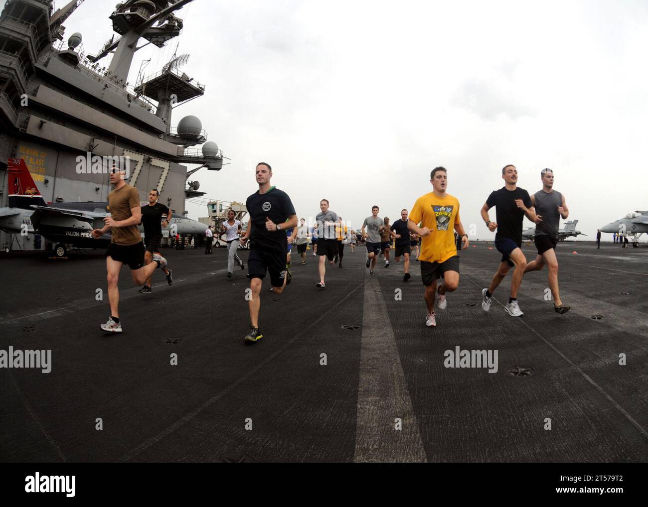 US Navy Sailors participate in the 5-kilometer Run to Remember on the ...