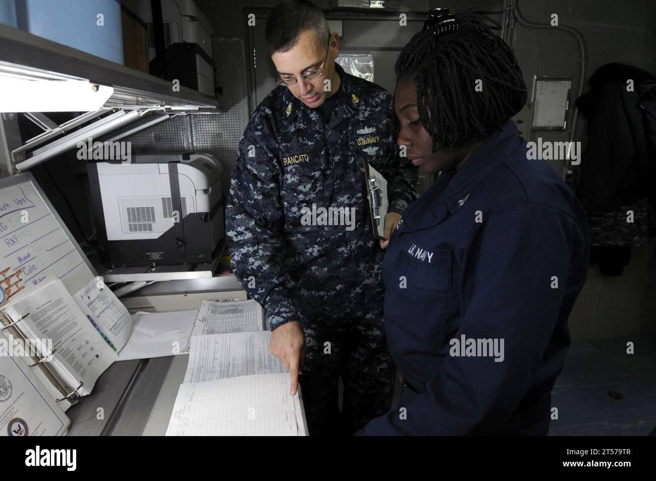 US Navy Sailors performs a planned maintenance system spot check.jpg ...