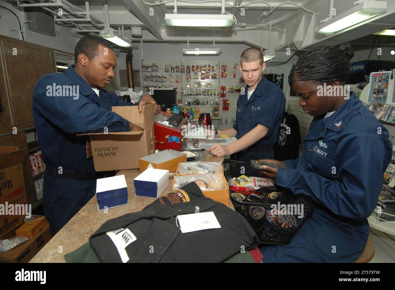 US Navy Sailors perform the monthly inventory assessment of the ship's ...