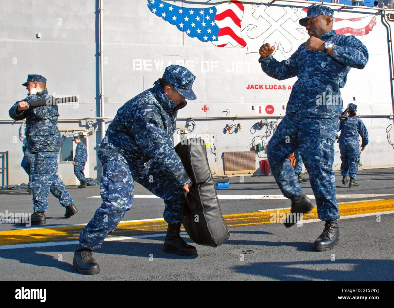 US Navy Sailors practices self-defense kicks during Navy security force sentry training.jpg ...