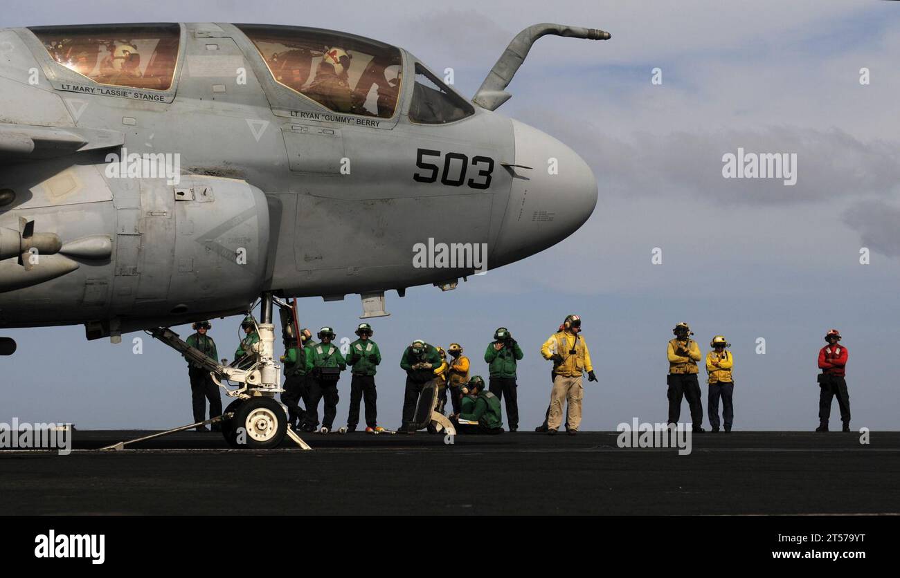 US Navy Sailors prepare an EA-6B Prowler assigned to Electronic Attack Squadron (VAQ) 134, for ...