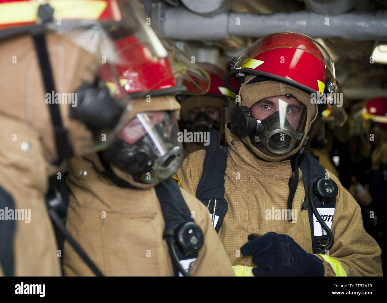 US Navy Sailors prepare for a general quarters training exercise aboard ...