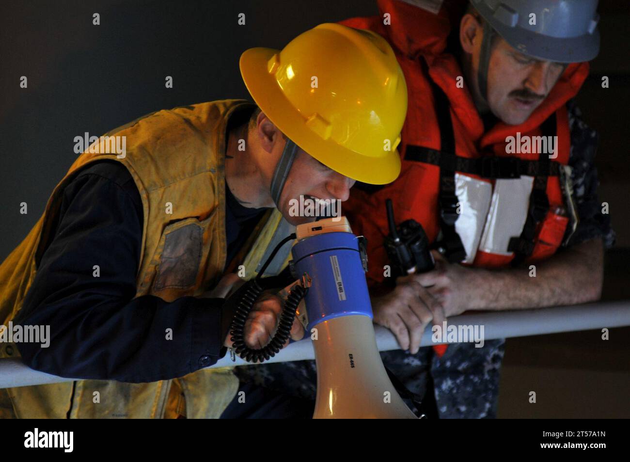 US Navy Sailors ready a rigid-hull inflatable boat during a man ...