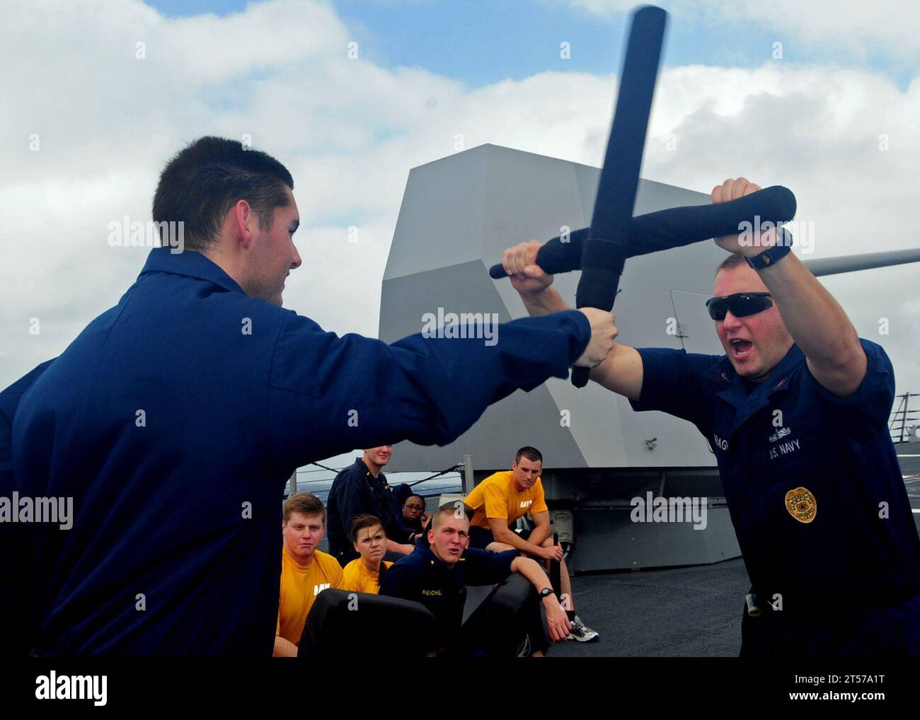 US Navy Sailors practice crowd control tactics during combat training ...