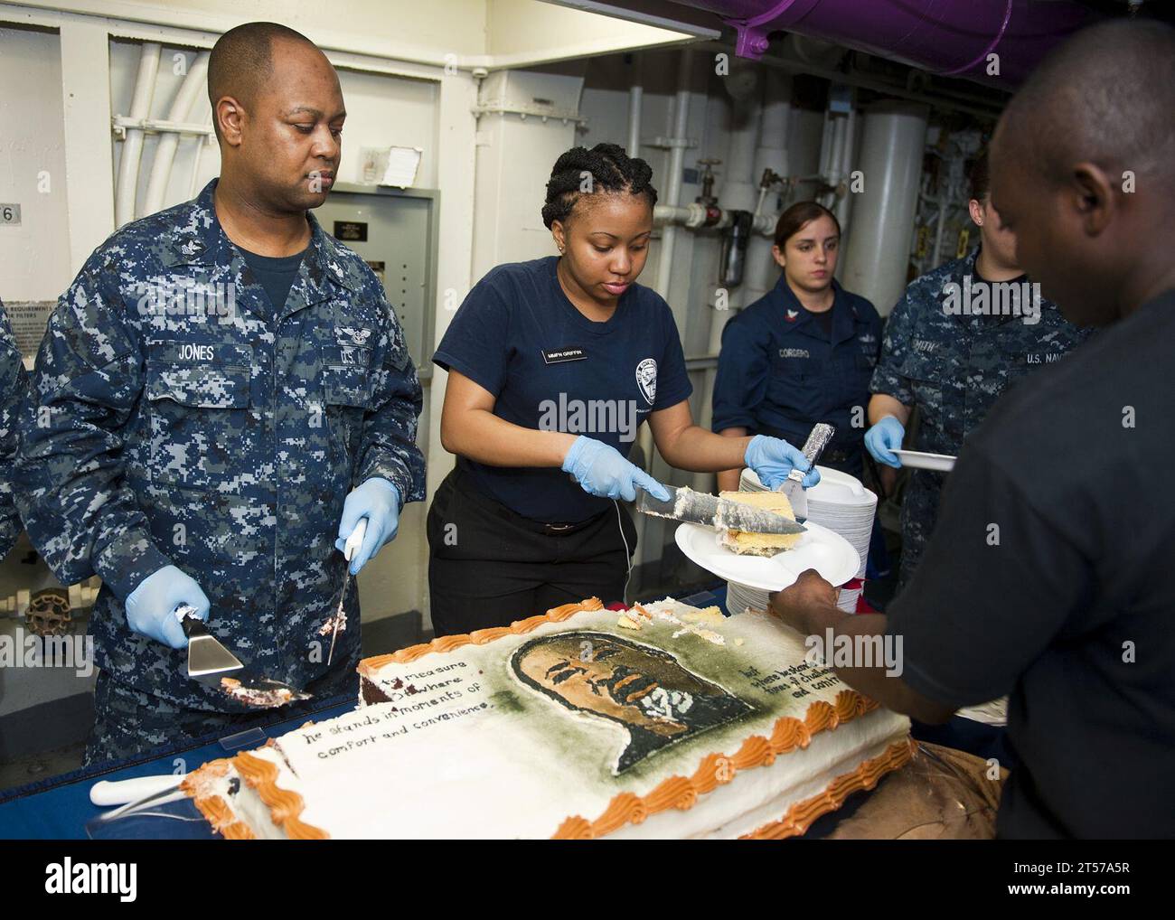 US Navy Sailors serve cake during a Dr. Martin Luther King, Jr ...