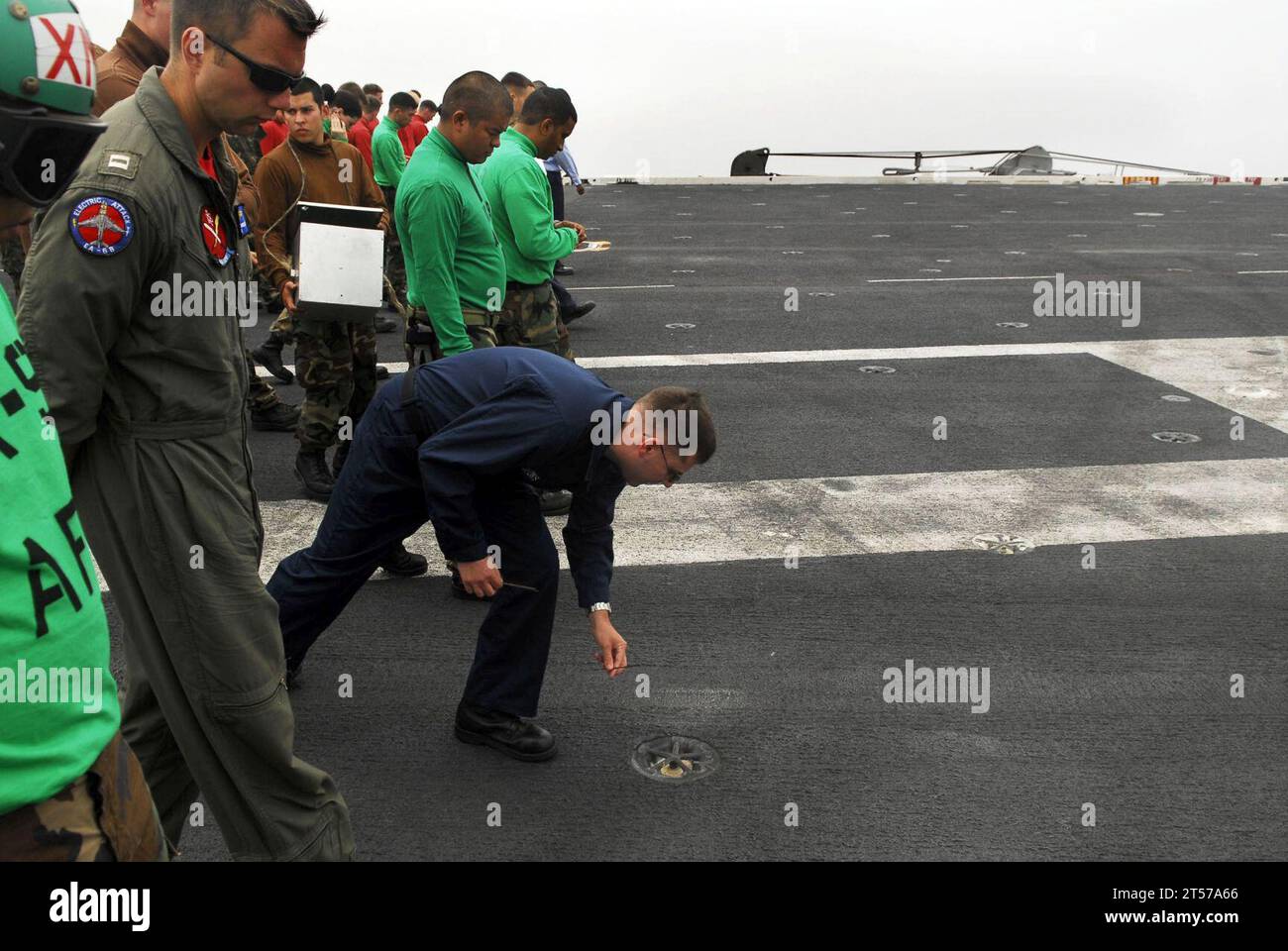 Us Navy Sailors Search The Flight Deck For Foreign Object Debris Fod During A Fod Walkdown