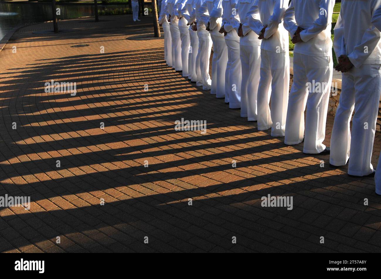 US Navy Sailors stand at parade rest during a ceremony at the USS ...