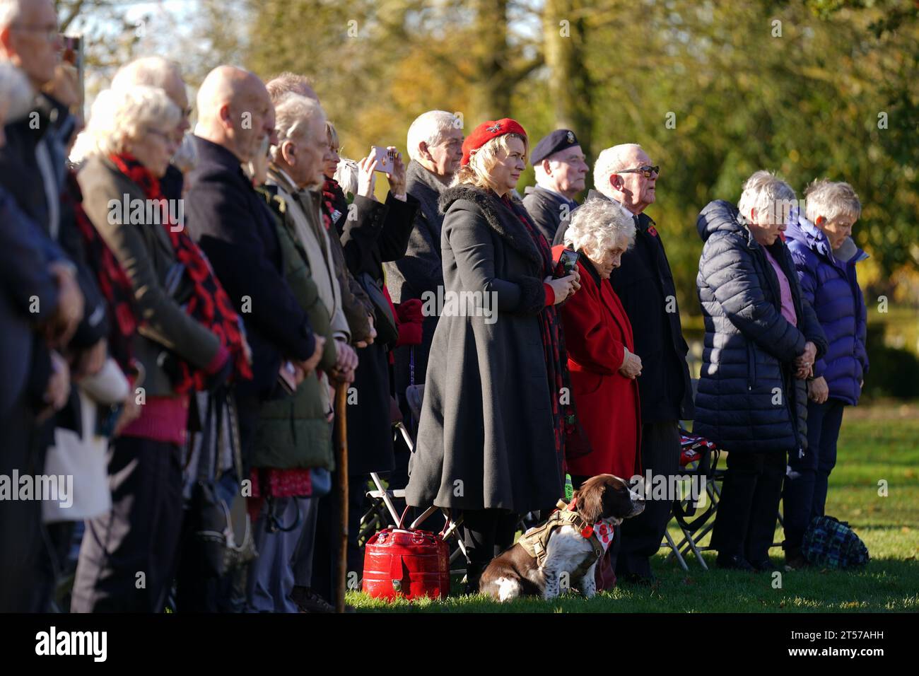 People observe a two minute silence during the official opening of the ...