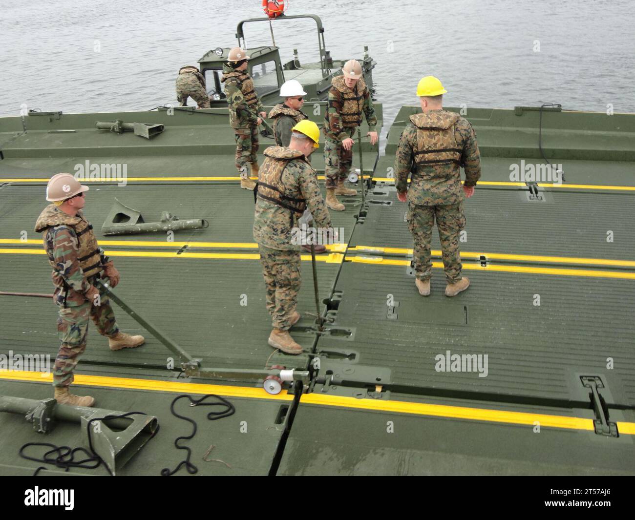 US Navy Seabees from Naval Mobile Construction Battalion (NMCB) 133 and Marines from the 8th ...